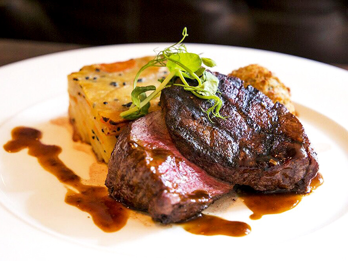 This isn't just a steak; it's a masterpiece of primal simplicity. The kind of dish that makes conversation stop and eyes roll back in pure pleasure.