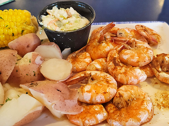 Perfectly seasoned shrimp nestled alongside red potatoes and corn on the cob &ndash; a holy trinity of Gulf Coast comfort that speaks to your soul.