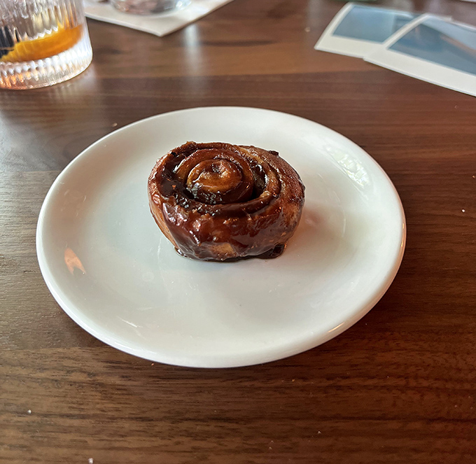 Behold the star of the show: a sticky bun so perfect it deserves its own spotlight and standing ovation.