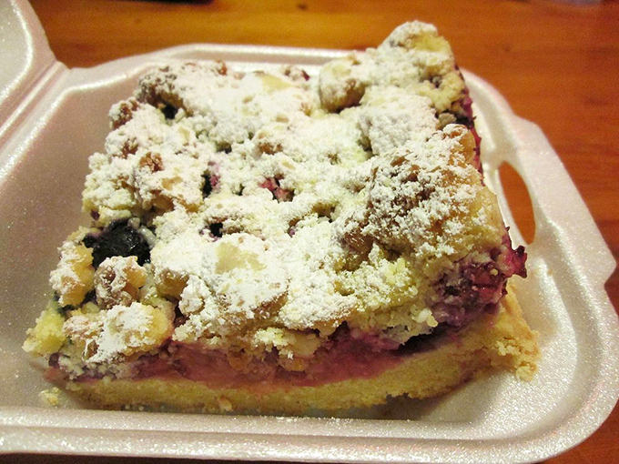 Berry nirvana! This crumbly, buttery strawberry treasure isn't just dessert, it's the reason people drive for hours along Michigan's scenic roads.