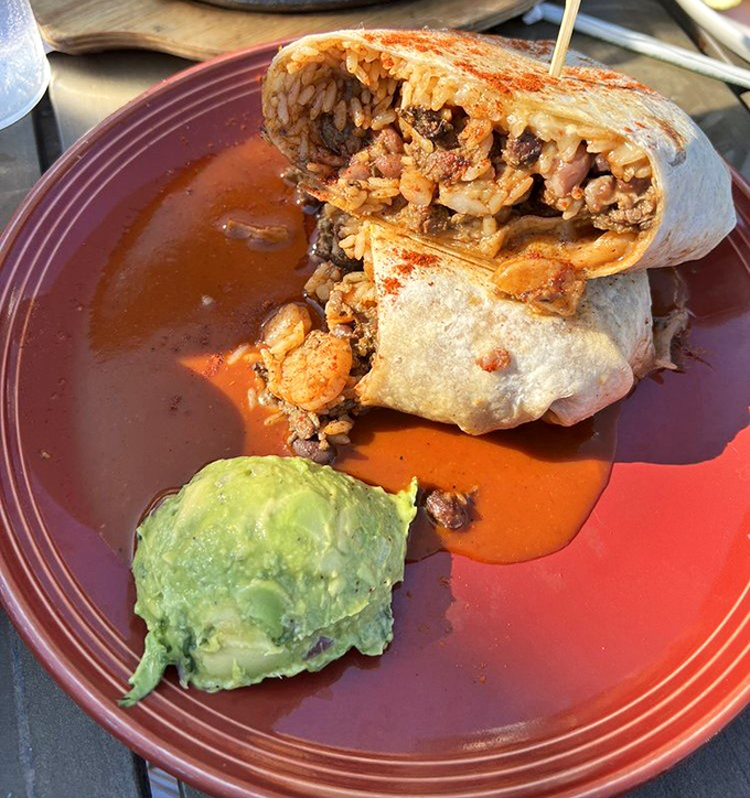 The Surf & Turf Burrito doesn't just break down the land-sea barrier—it creates a peaceful, delicious alliance wrapped in a warm tortilla.