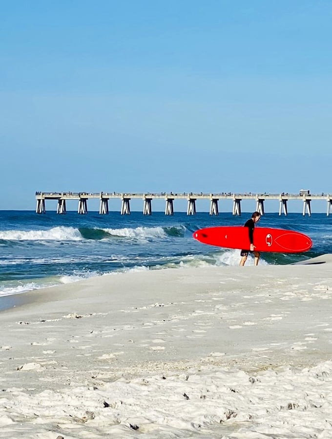 Surf's up! The Navarre Beach Pier creates the perfect backdrop for catching waves or, in my case, catching others catching waves.