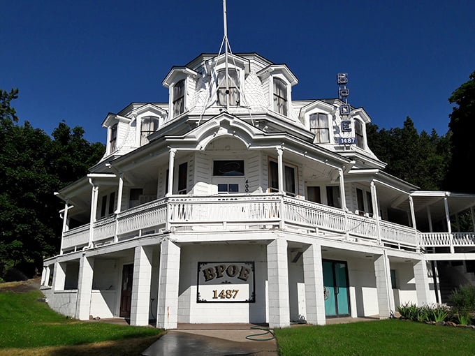 The magnificent Elks Lodge stands as a testament to bygone architectural grandeur&mdash;like a wedding cake designed by someone who really, really loved columns.