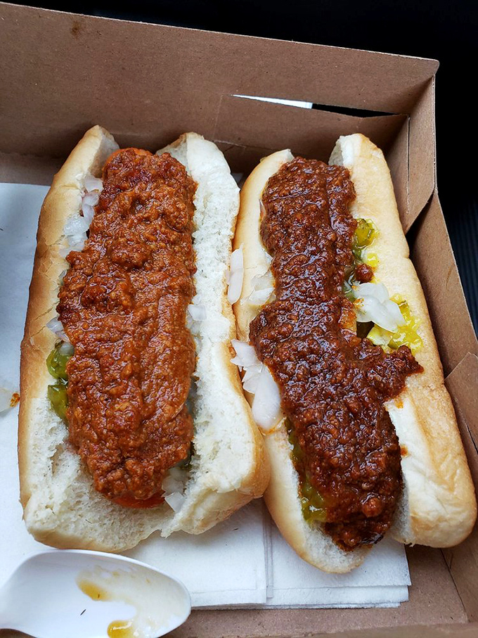 These chili dogs aren't just topped—they're smothered in a rich, meaty lava that demands both napkins and respect. Worth every delicious mess.