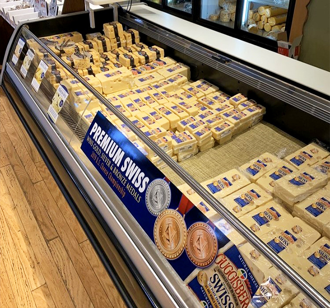Behold the yellow kingdom! Award-winning Swiss cheese stacked with military precision, each package containing the culmination of generations of dairy wisdom.
