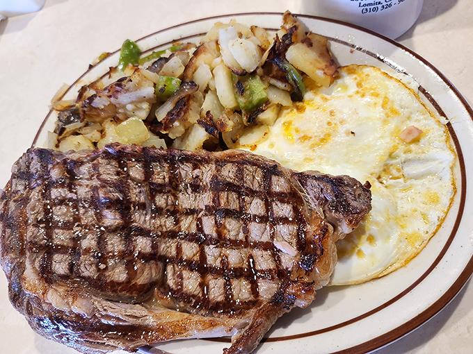 This isn't just any steak and eggs&mdash;it's the reason alarm clocks were invented. Perfect grill marks tell you everything you need to know.