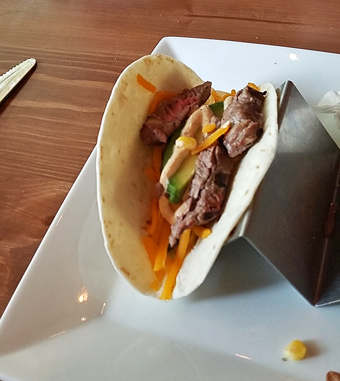 This taco isn't just food&mdash;it's edible architecture. Perfectly seared steak, fresh veggies, and a tortilla that's achieved that elusive perfect toast.