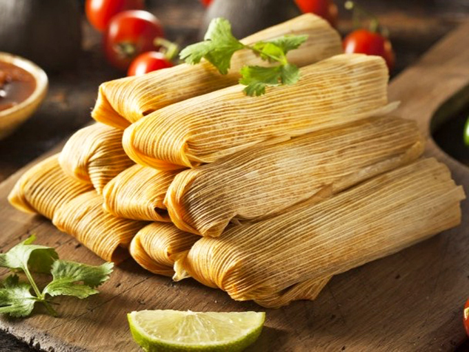 Perfectly wrapped bundles of joy waiting to steam up your life. These corn husk-wrapped treasures are the original "food delivery system" perfected over centuries.