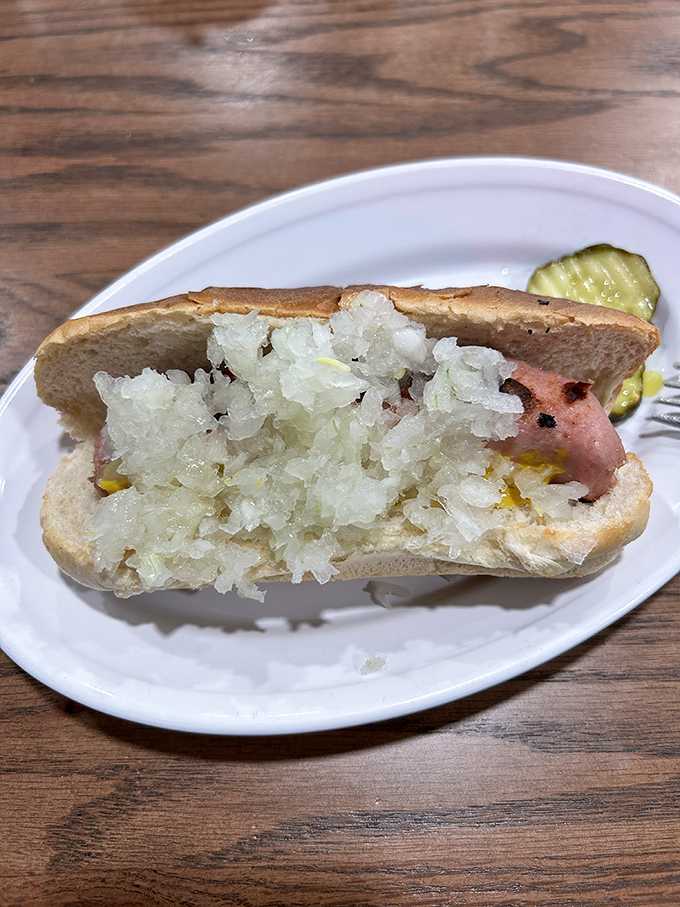 This isn't just a hot dog&mdash;it's a Gettysburg peace treaty between bun and frank, where sauerkraut plays neutral mediator to delicious effect.