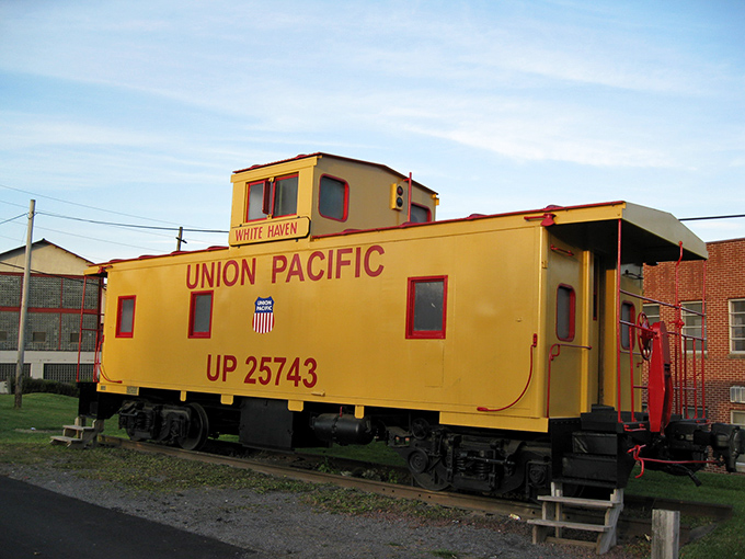 This bright yellow Union Pacific caboose brings railroad nostalgia right to White Haven's downtown streets.