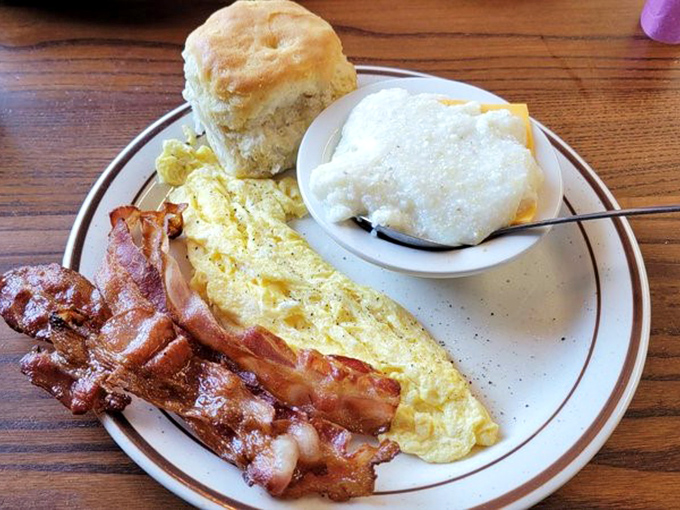 Scrambled eggs that actually taste like eggs, bacon with perfect crisp-to-chew ratio, and grits that would make your Southern grandmother nod in approval.