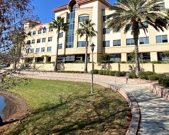 Modern healthcare facilities surrounded by palm trees &ndash; because even your doctor's visits should come with vacation vibes.
