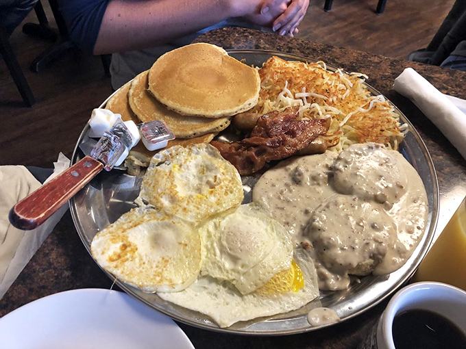 Behold the Ultimate Breakfast&mdash;a magnificent platter where eggs, pancakes, bacon, and gravy coexist in perfect harmony like the Beatles in their prime.