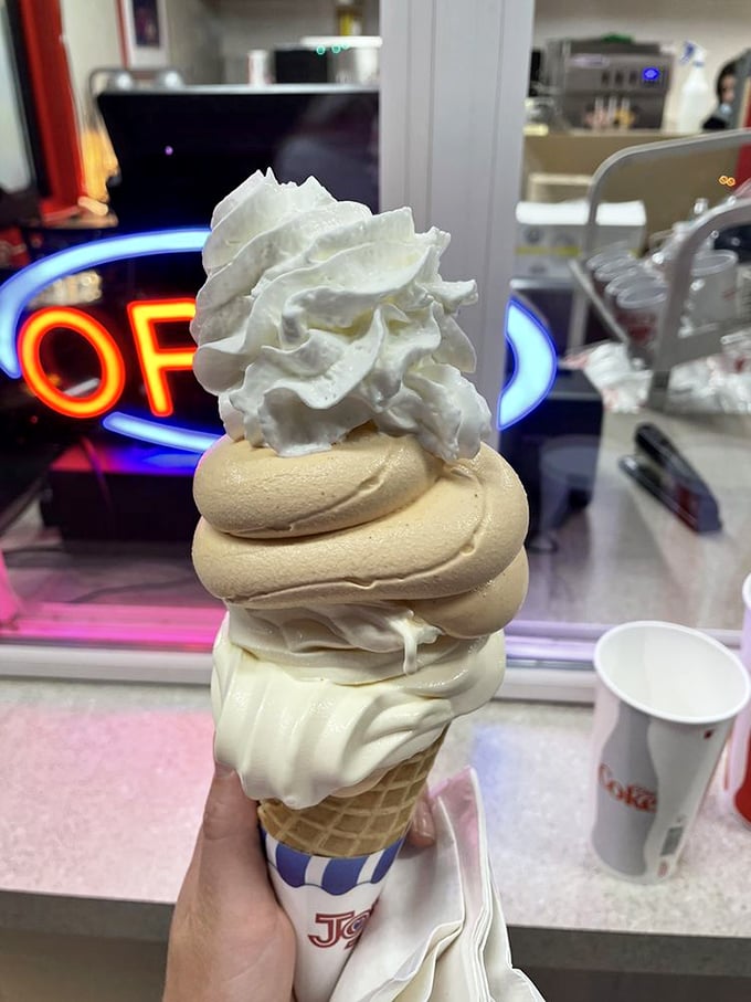 Behold the architectural marvel that is Mike's soft serve&mdash;a towering swirl of vanilla and pumpkin that defies both gravity and sadness.