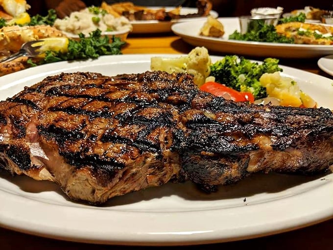 This isn't just a steak; it's a masterpiece of meat artistry with perfect grill marks that would make Picasso jealous and juiciness that demands a moment of respectful silence.