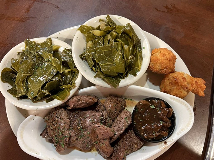 Venison medallions that would make any hunter proud, served with collard greens cooked to Southern perfection. This isn't food&mdash;it's Florida heritage on a plate.