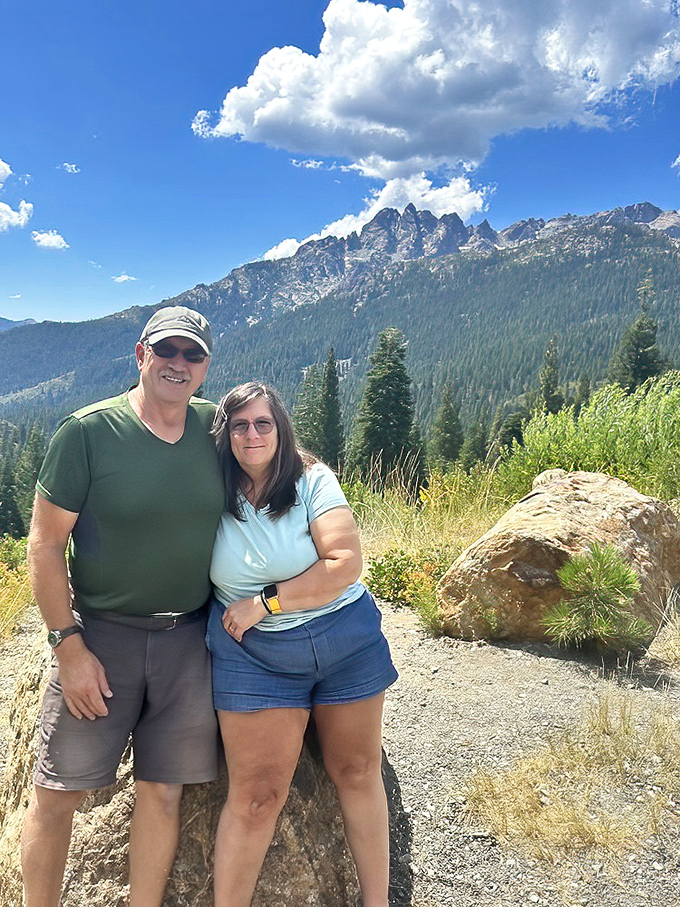 Mountain majesty makes the perfect backdrop for vacation memories. Those jagged peaks have been photobombing family portraits since before selfies existed.