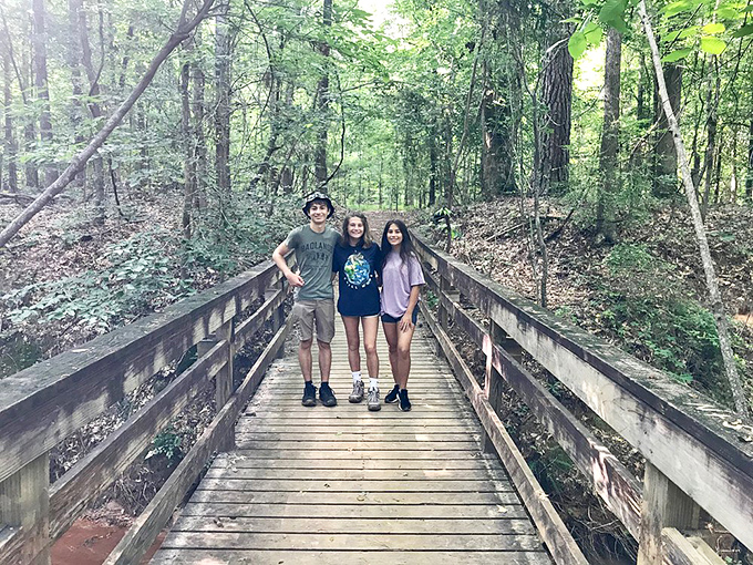 The wooden boardwalk leads adventurers deeper into this geological wonderland that shouldn't exist in Georgia.
