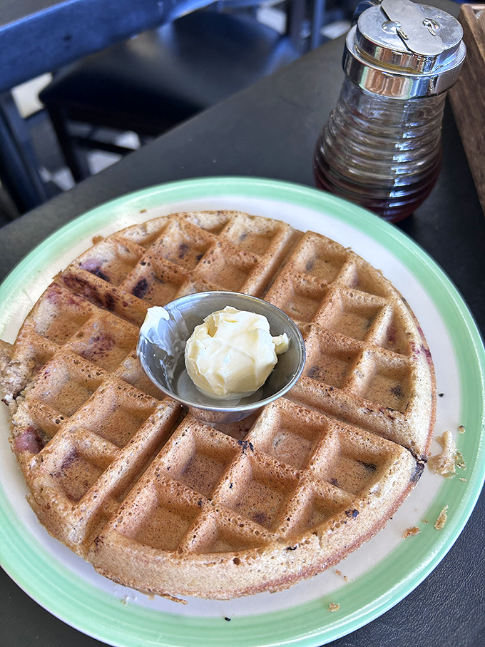 Golden-brown perfection meets weekend indulgence. This waffle doesn't need animal products to achieve breakfast nirvana&mdash;just maple syrup and that little pat of plant butter.