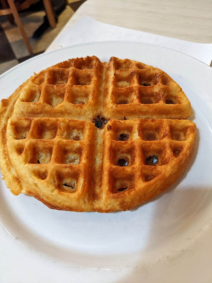 Golden, crispy edges giving way to a fluffy interior&mdash;this waffle isn't just breakfast, it's an architectural achievement worthy of its own Wisconsin monument.