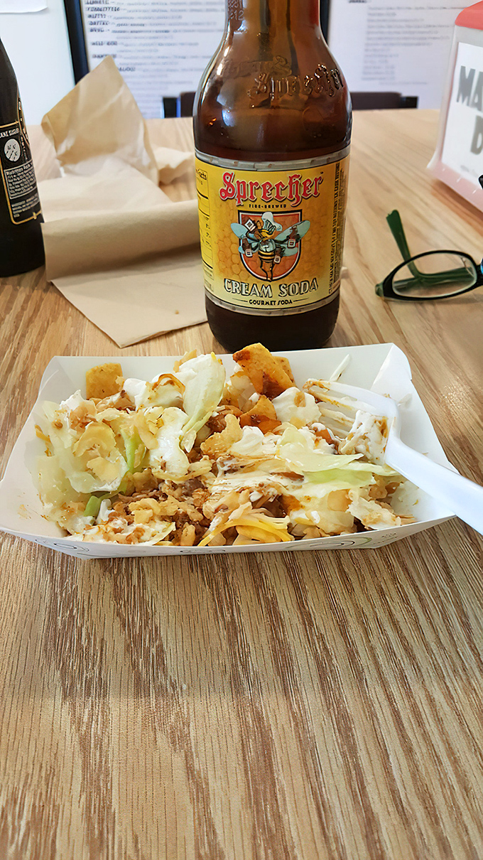 This isn't your average walking taco&mdash;it's a portable flavor festival paired with craft soda that makes standard ballpark fare look like it's not even trying.