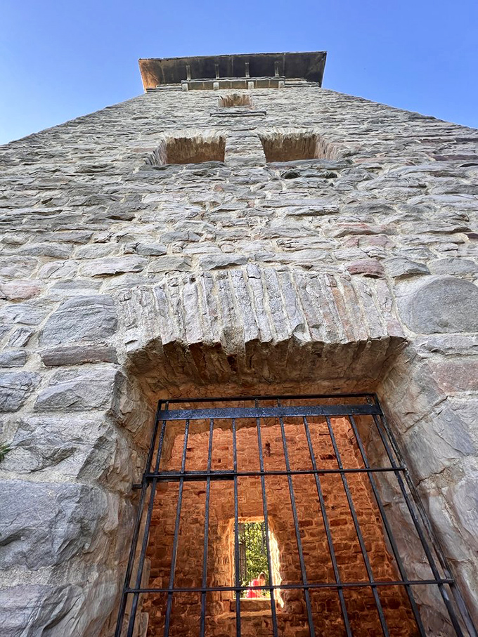 Looking up at weathered stone reveals craftsmanship that puts modern construction to shame, honestly.