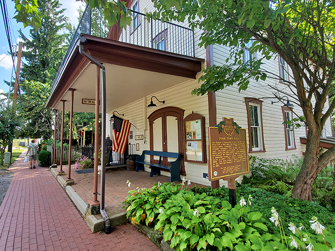 The town hall's brick facade has witnessed more community decisions than a PTA meeting marathon.