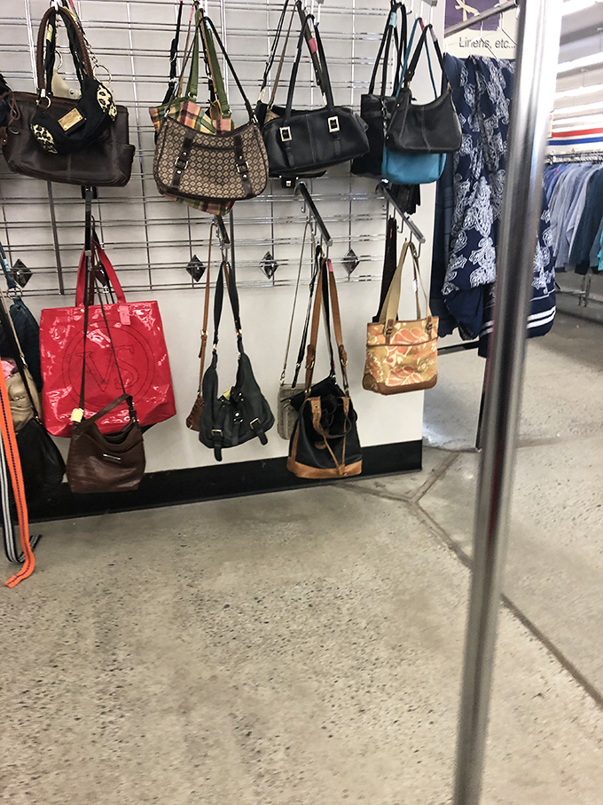 Handbag heaven! Designer dreams hang in suspended animation, waiting for someone to rescue them from retail purgatory at a fraction of their original price.