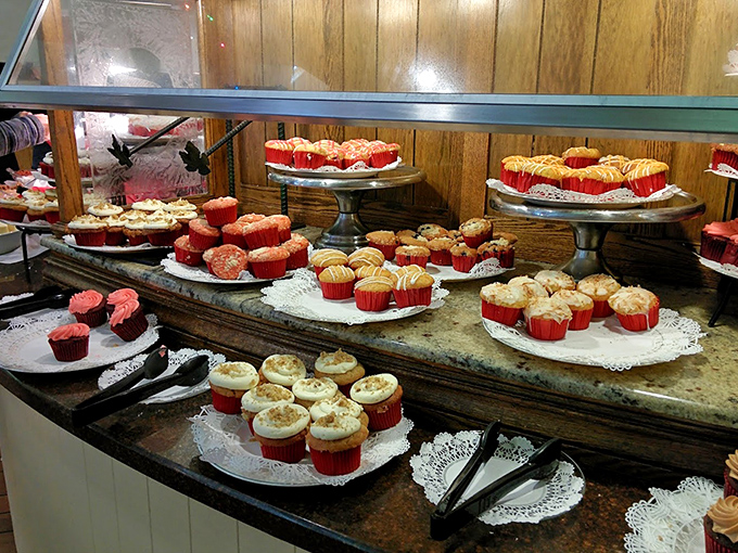 Cupcake heaven! These little red-dressed beauties stand at attention like delicious soldiers, each one a different sweet battle against your willpower.