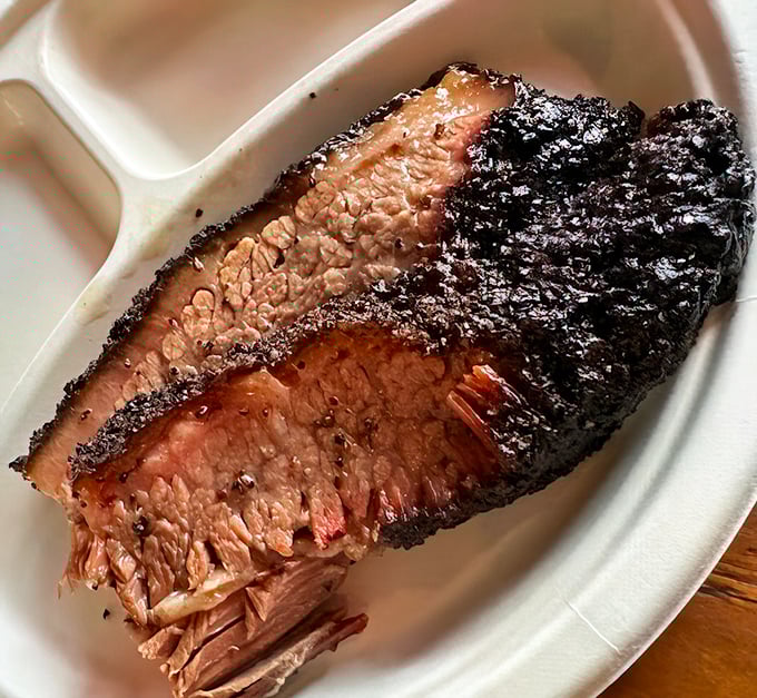 Behold the brisket &ndash; that bark, that smoke ring, that tenderness! This isn't just meat; it's a religious experience on a plate.