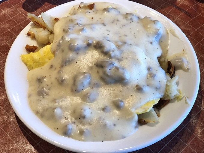 Breakfast of champions? More like breakfast of people who plan to champion a nap afterward. This gravity-defying portion of biscuits and gravy means business.