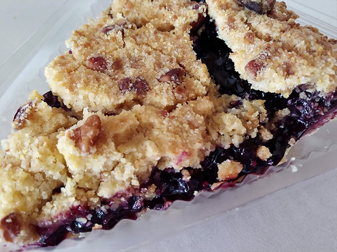 Behold the blueberry masterpiece: plump berries nestled in golden pastry like edible jewels in a treasure chest.