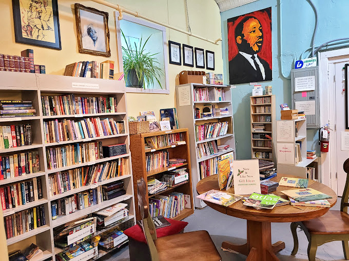Literary treasures line these shelves, with the MLK portrait watching over a collection that feeds both mind and soul.