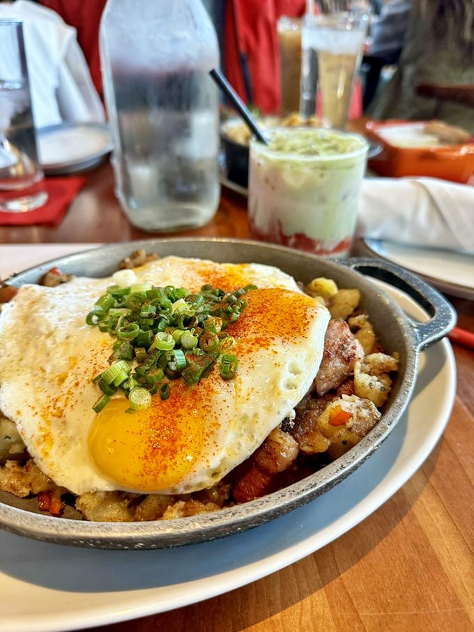 Breakfast hash that makes you want to write poetry. The sunny-side-up egg crowns this skillet like royalty overseeing a kingdom of potatoes.