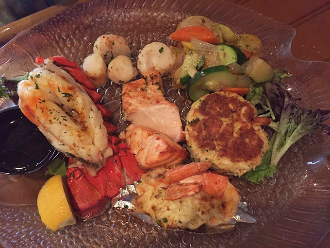 The broiled seafood combo arrives like a treasure chest, showcasing the kitchen's mastery of delicate preparations.