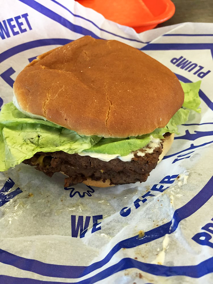 The classic Kewpee burger&mdash;where the patty hangs slightly over the bun like a meat waterfall of deliciousness.