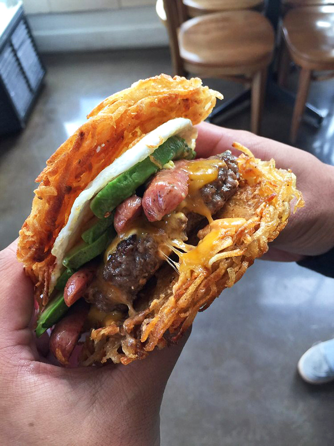 Behold the hash brown burger – culinary rebellion at its finest. Like wearing a tuxedo jacket with jeans, it's unexpected brilliance that just works.