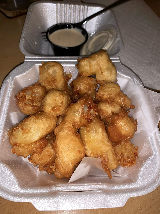 These golden-battered cheese curds aren't just appetizers&mdash;they're little nuggets of joy that make you question why you'd ever share them.