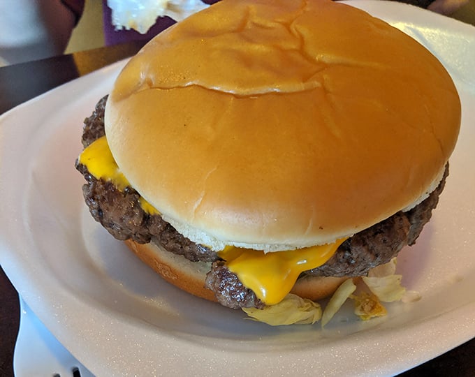 Behold the cheeseburger in its natural habitat&mdash;a simple white plate that knows it's merely a stage for the real star of the show.