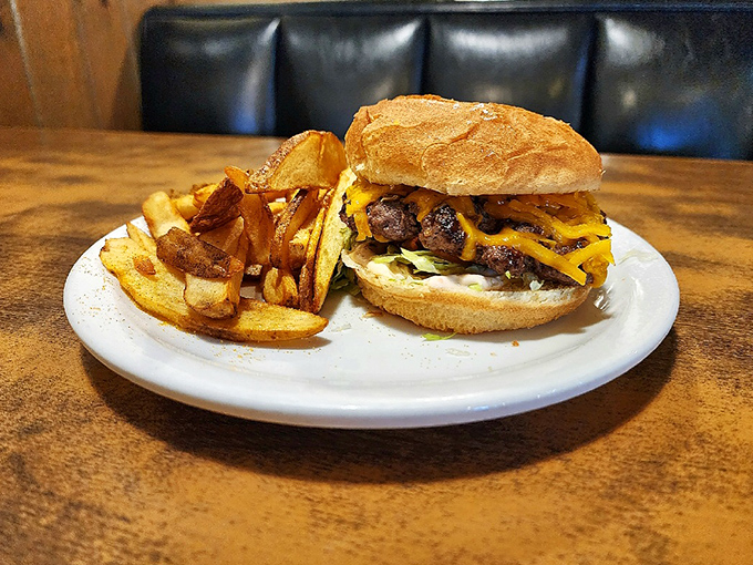 Behold the masterpiece that proves sometimes perfection comes wrapped in simple, golden-brown packaging with crispy fries.