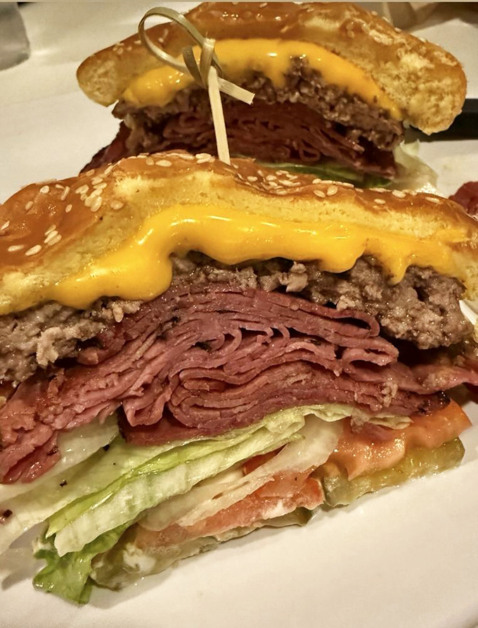 This isn't just a sandwich; it's a skyscraper of flavor with layers of pastrami and beef that would make Manhattan architects jealous.