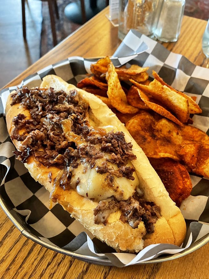 Behold the star of our show! This cheesesteak isn't just a sandwich; it's what would happen if comfort food went to finishing school.