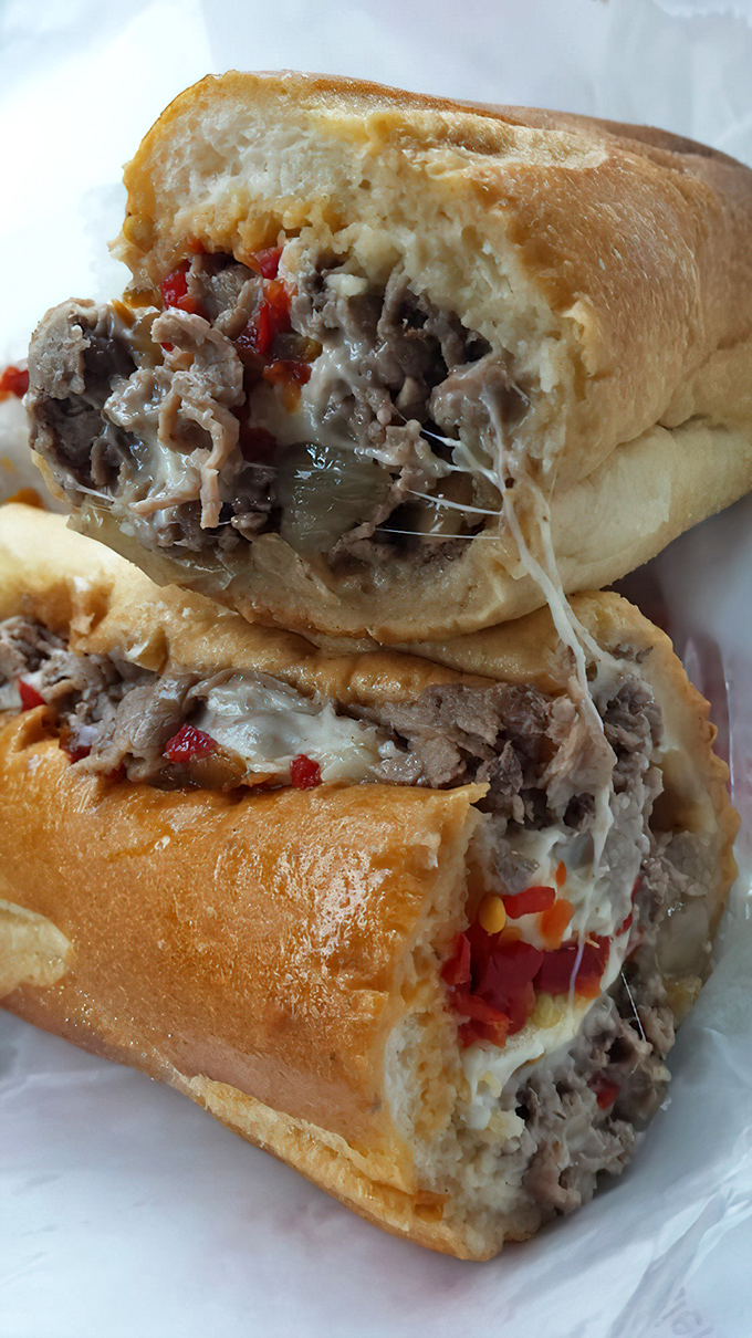 The cheesesteak in its natural habitat&mdash;tender ribeye embraced by melted cheese and nestled in a perfect roll. This is the sandwich Philadelphia built its reputation on.