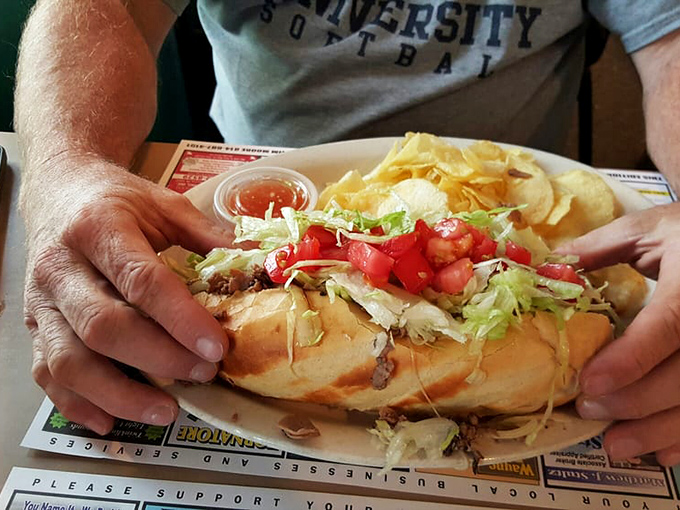 Behold sandwich perfection! This loaded cheesesteak bursts with thinly sliced beef, melted cheese, and fresh toppings that would make even Philadelphia natives nod in approval.