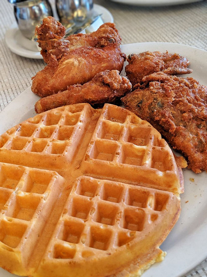 The fried chicken and waffle combo: where Southern comfort meets Midwestern hospitality on a plate that demands to be photographed.