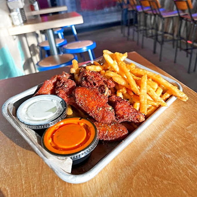 These aren't your average wings &ndash; crispy, seasoned to perfection, and served with dipping sauces that'll have you contemplating drinking them straight.