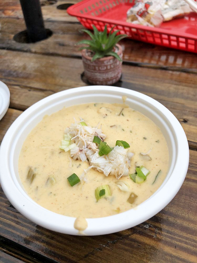 Creamy stone crab chowder that makes you question every other soup you've ever committed to memory. Those floating scallions aren't garnish&mdash;they're punctuation.