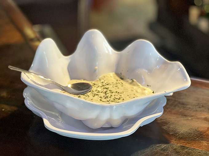 This isn't just clam chowder; it's a creamy masterpiece served in a shell-shaped bowl. The kind of dish that makes you consider moving to Florida permanently.