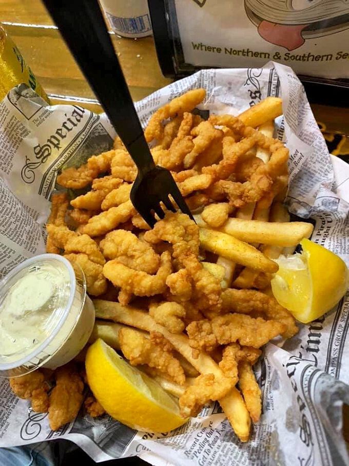 Golden-fried clam strips lounging on a bed of french fries&mdash;the seafood equivalent of finding an extra $20 in your pocket.