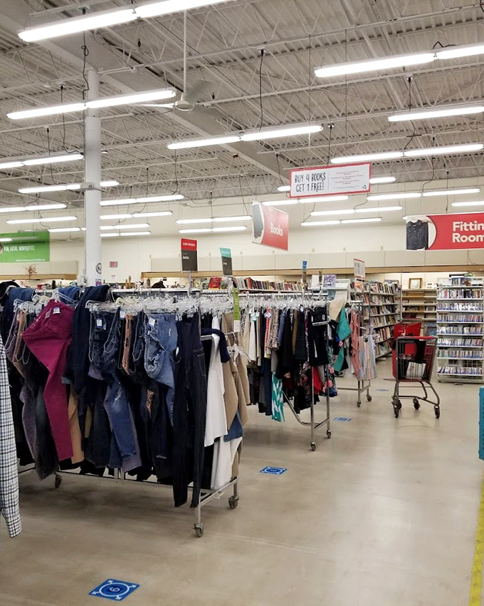 A rainbow of previously-loved garments awaits new adventures&mdash;each hanger a portal to someone else's fashion history.